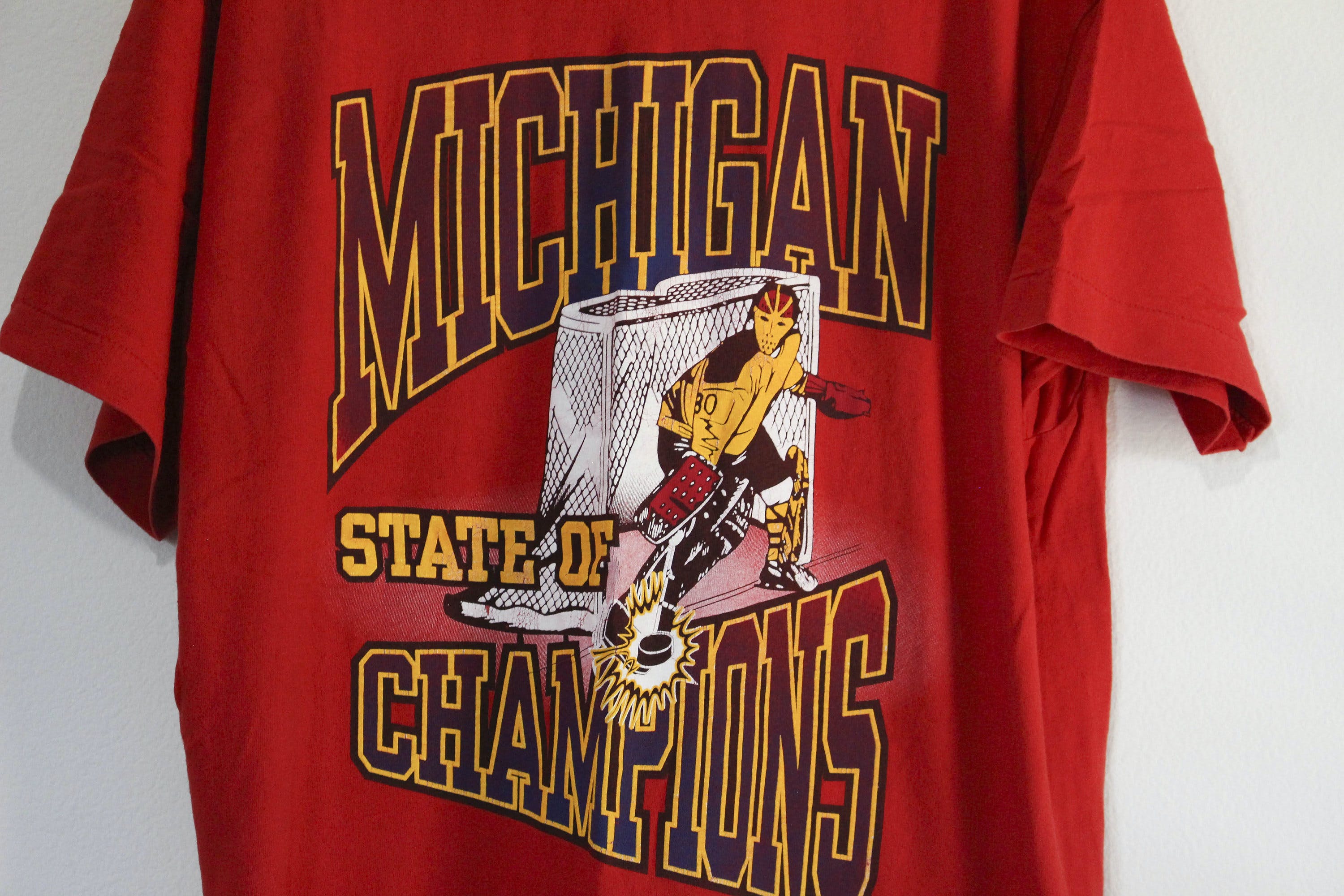 Vintage Red Michigan State Of Champions Hockey Graphic T-Shirt by Fruit ...