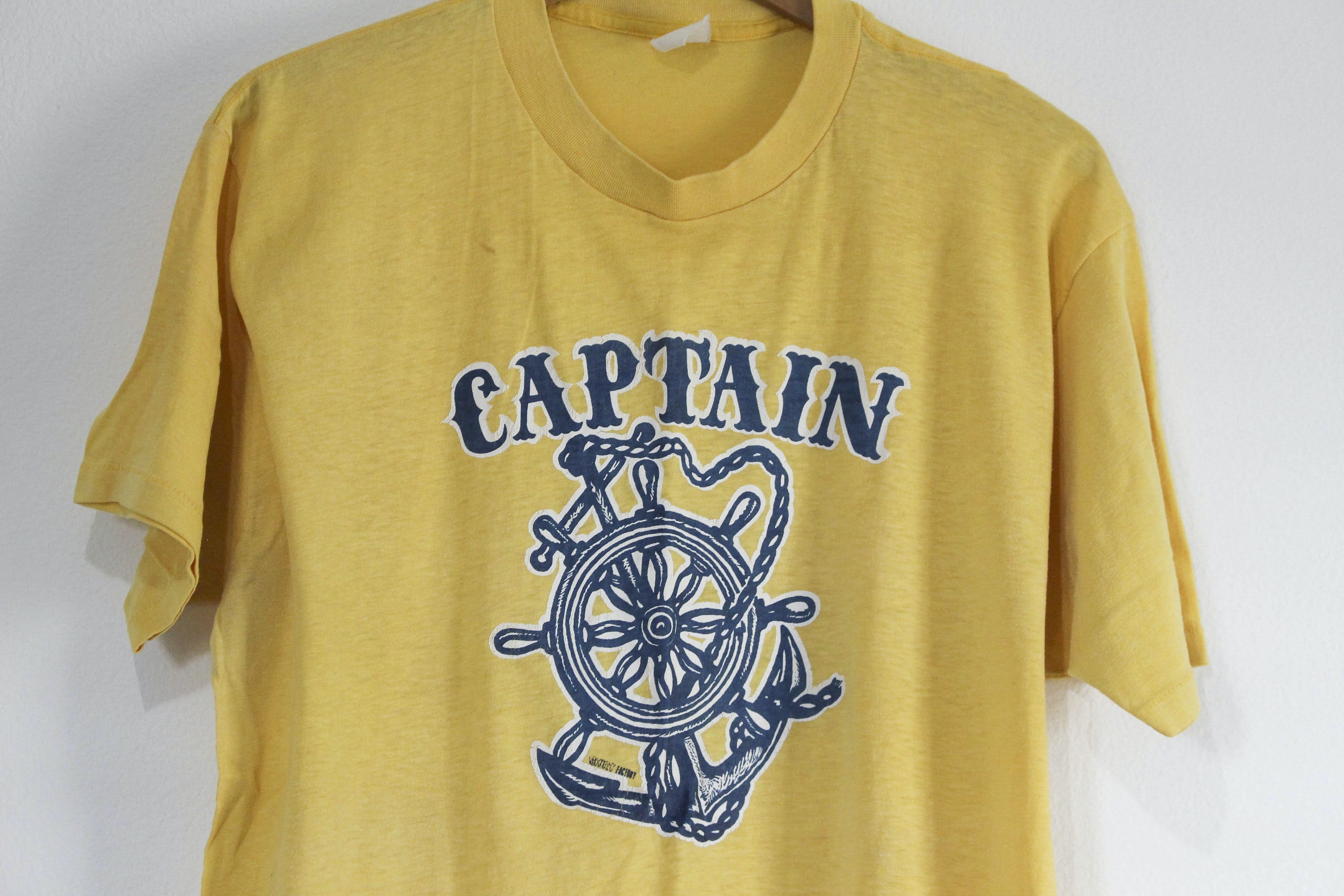Vintage Yellow with Blue Nautical Captain Graphic T-Shirt | Shop THRILLING