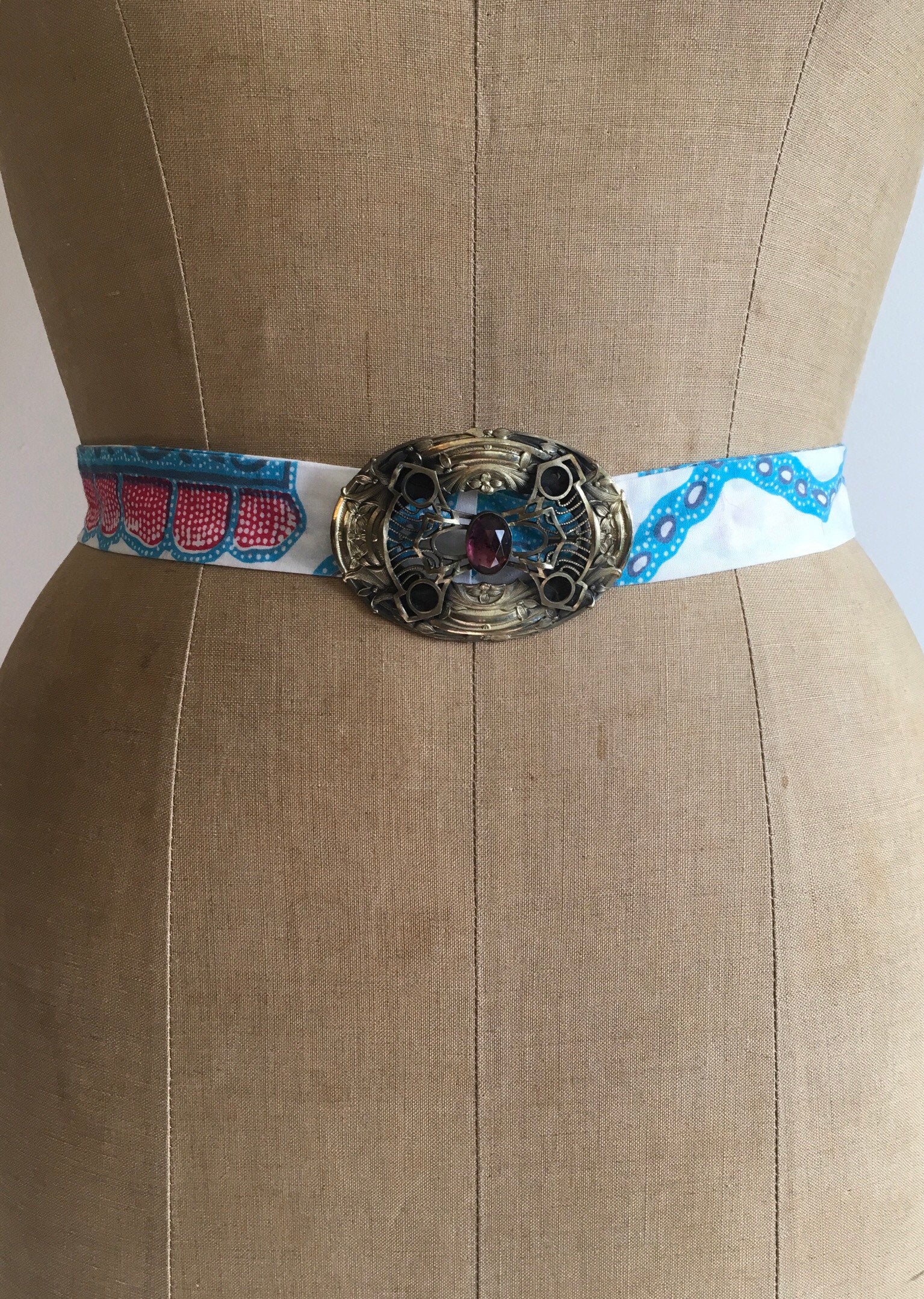 Vintage 10's/20's Brass Sash Brooch with Purple Stone | Shop THRILLING