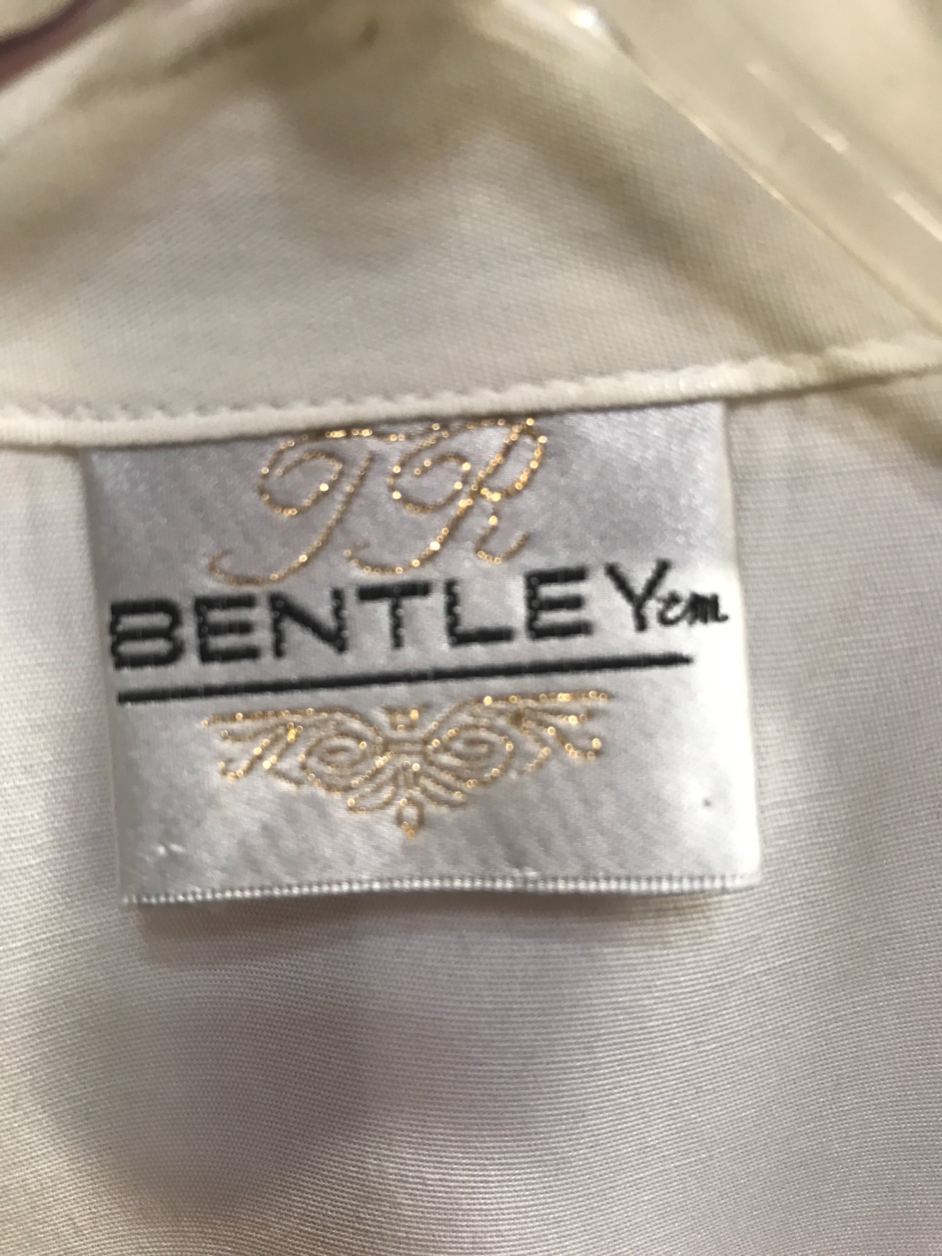 Vintage 80's White Four Button Collared Vest by Bentley | Shop THRILLING